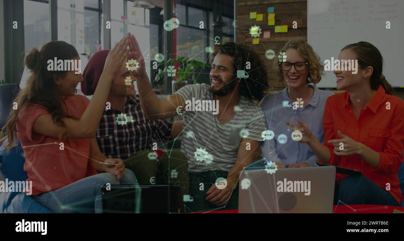 Image of globe of digital icon over group of diverse colleagues high ...