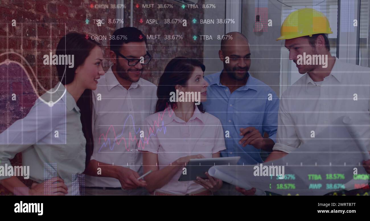 Image of graphs and trading boards over diverse engineer explaining ...