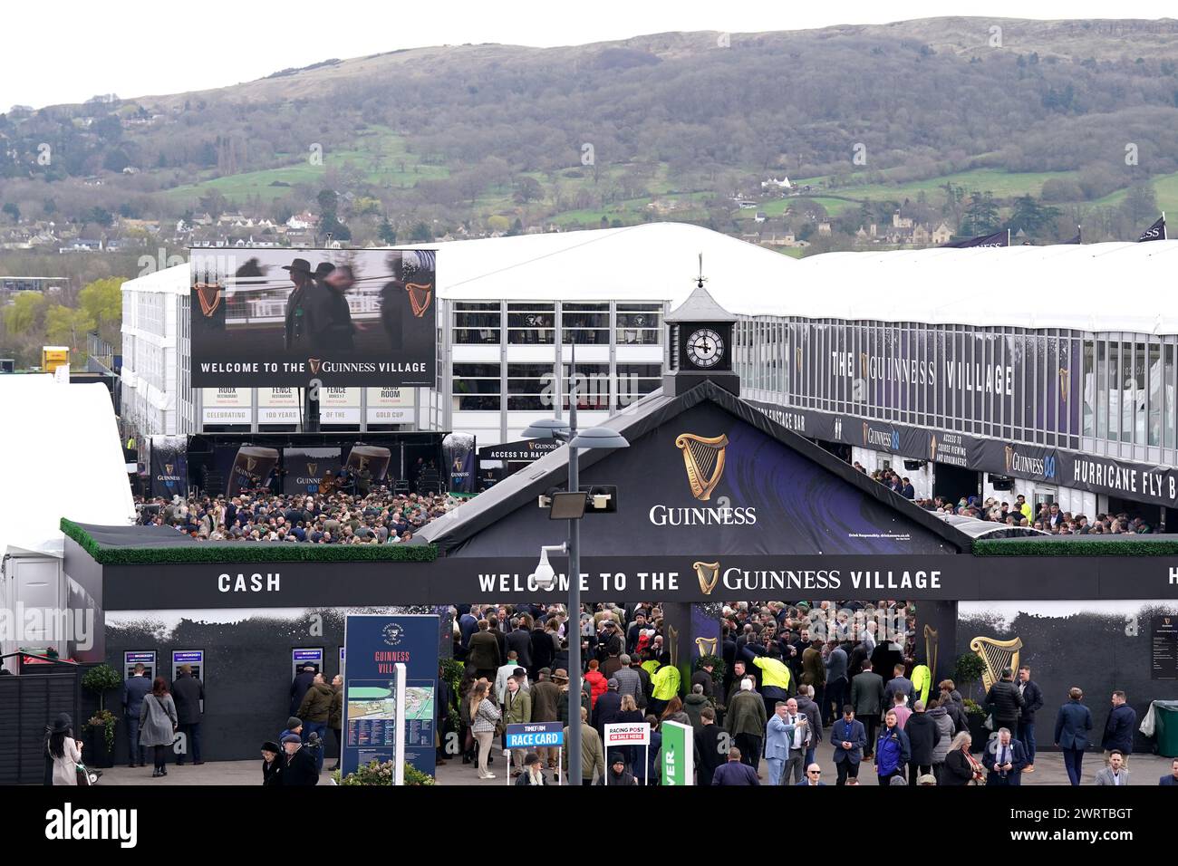 A general view of racegoers at the entrance on day three of the 2024 ...
