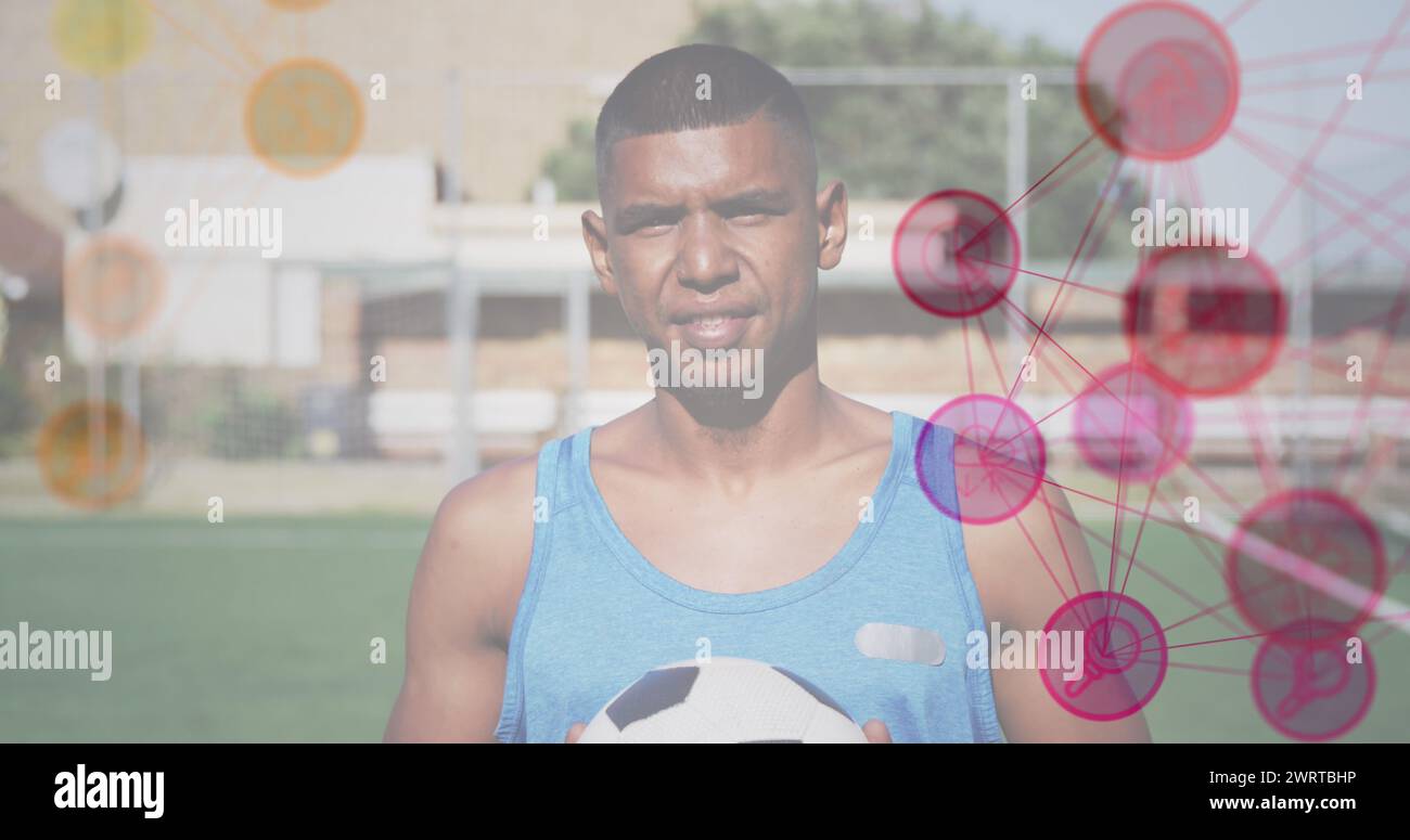 Image of networks of connections over football player with ball ...