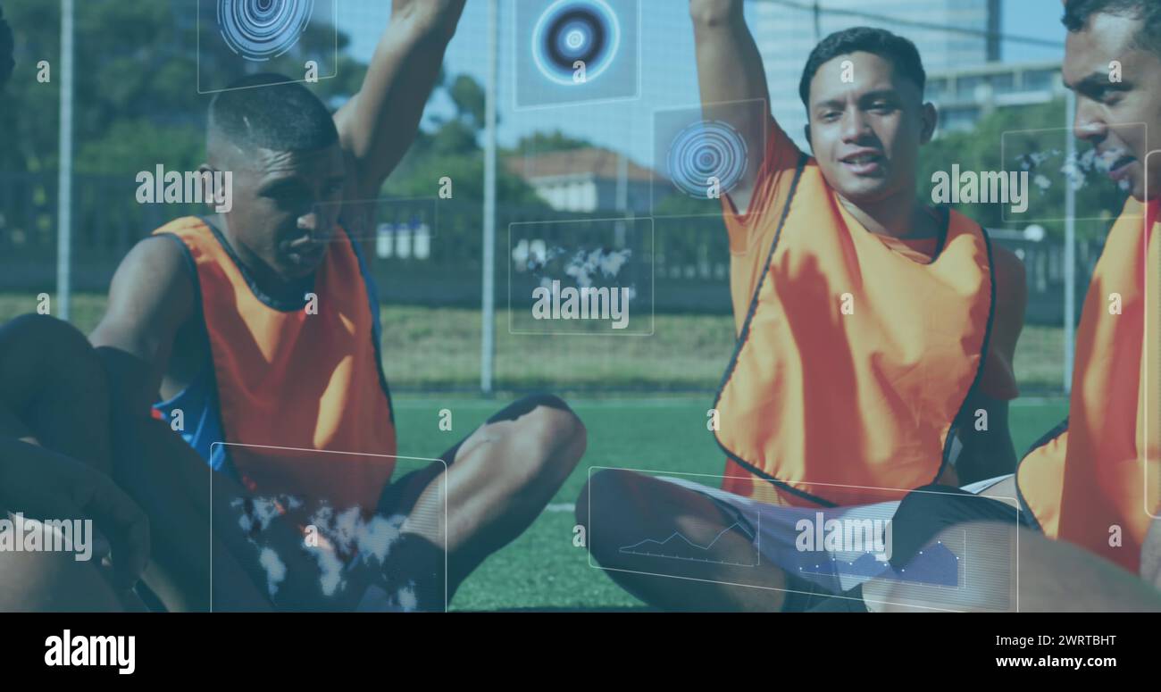 Digital interface with data processing against team of male soccer ...