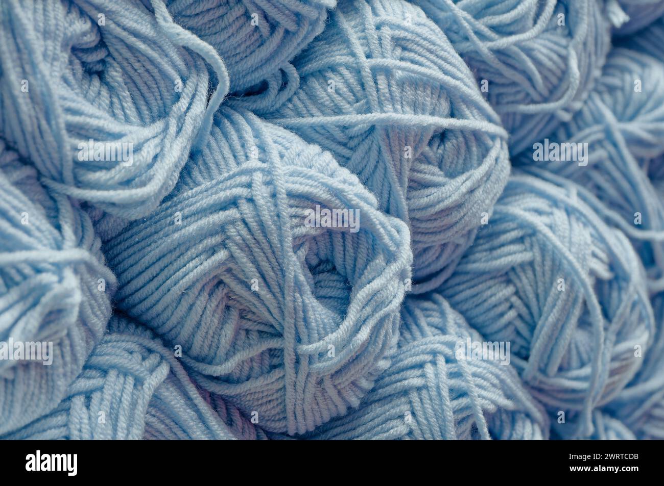 Multiple balls of blue threads, abstract textile background Stock Photo ...