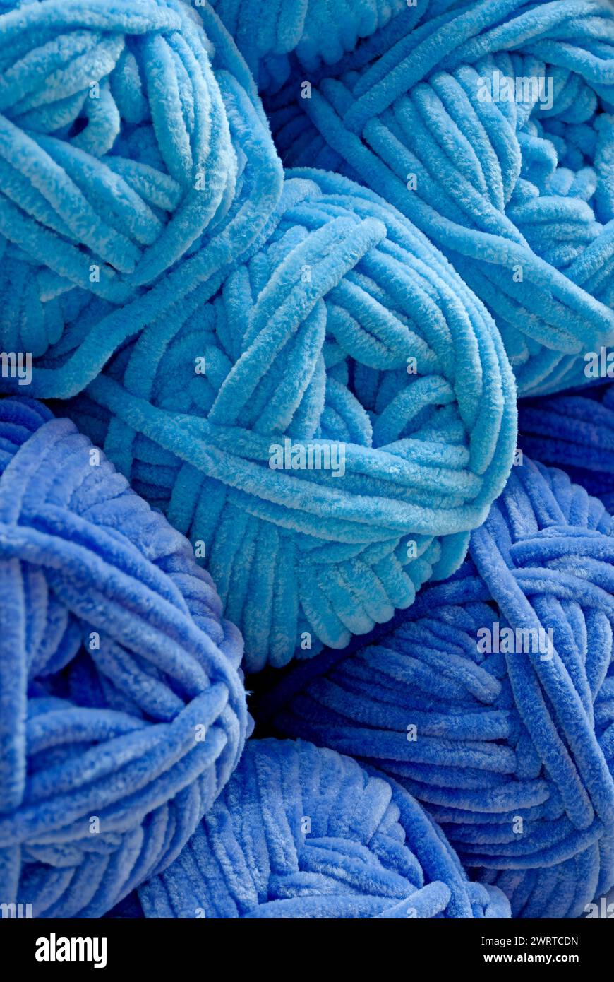 Multiple balls of blue threads, abstract textile background Stock Photo ...