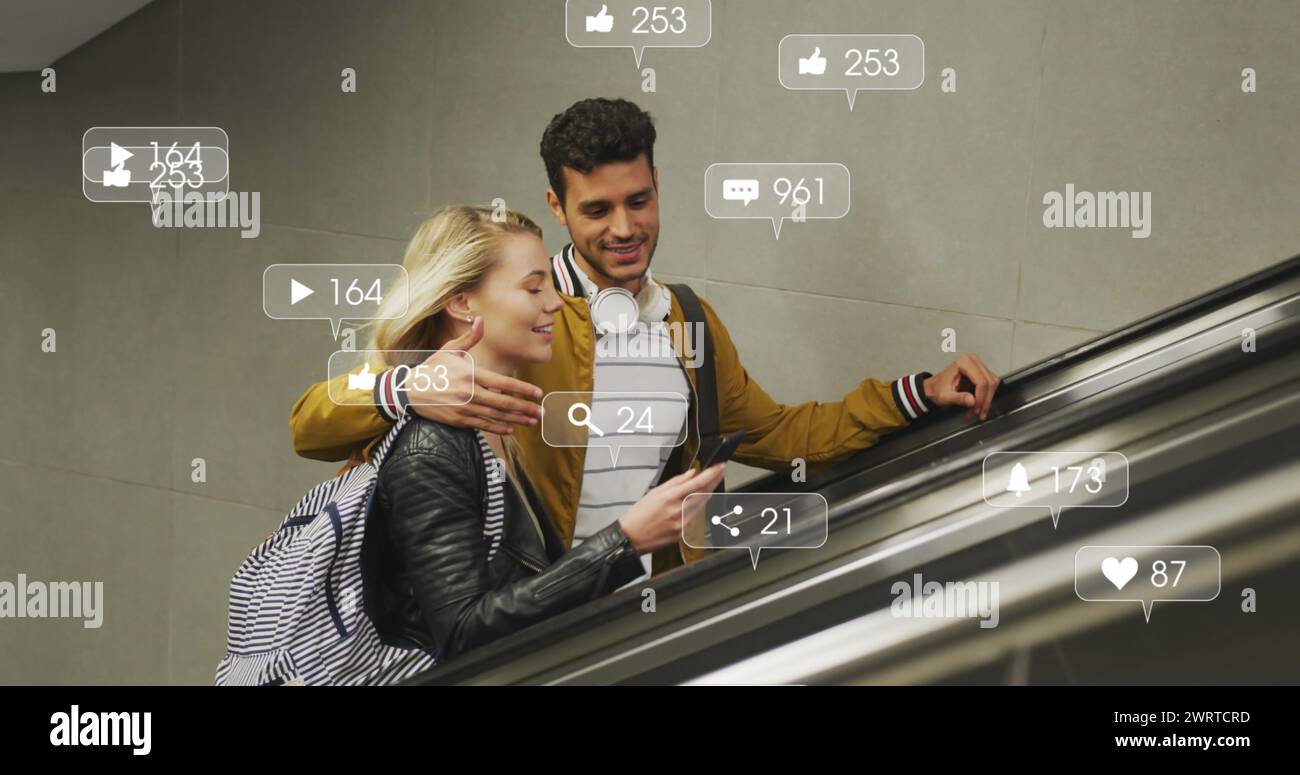Image of social media icons floating over happy diverse couple ...