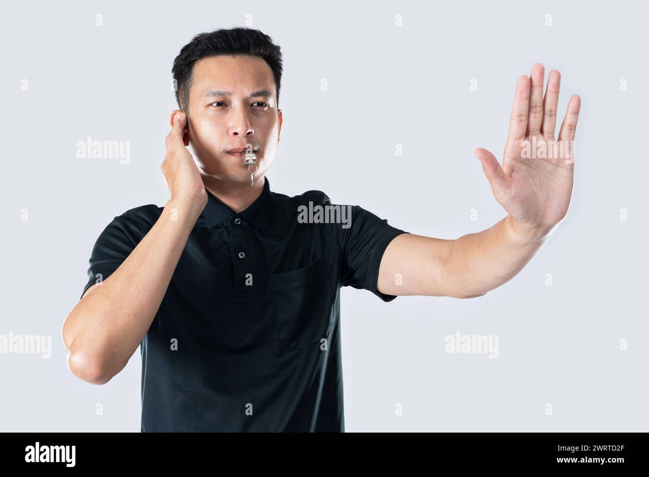 Football referee showing VAR symbol on white background Stock Photo - Alamy