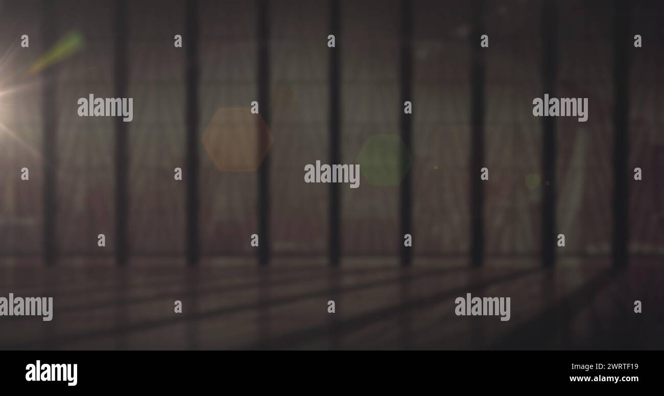 Hypnotic red and green lights flicker behind barred window in digital ...