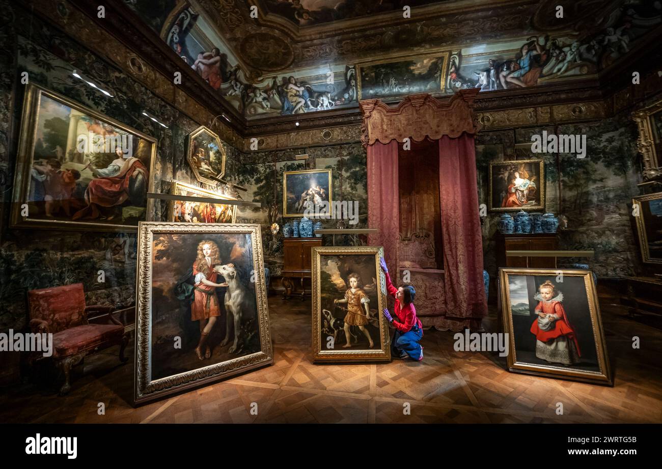 Curator Gill Hart puts the finishing touches the Picturing Childhood ...