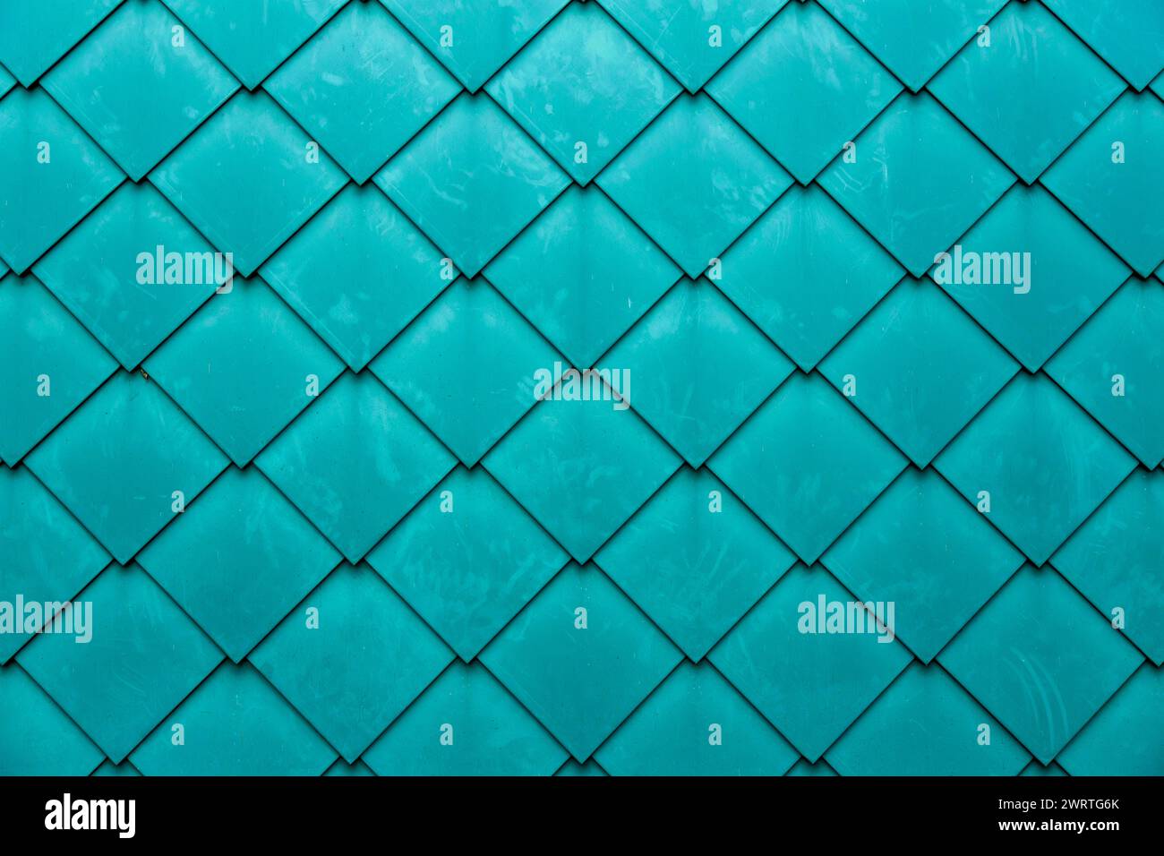 Diamond shaped fish scale tiled wall texture background close up Stock ...