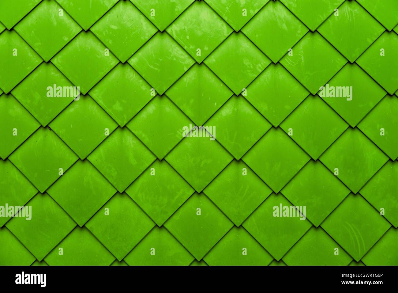 Diamond shaped fish scale tiled wall texture background close up Stock ...