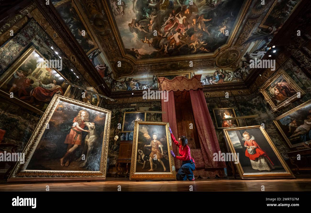 Curator Gill Hart puts the finishing touches the Picturing Childhood ...