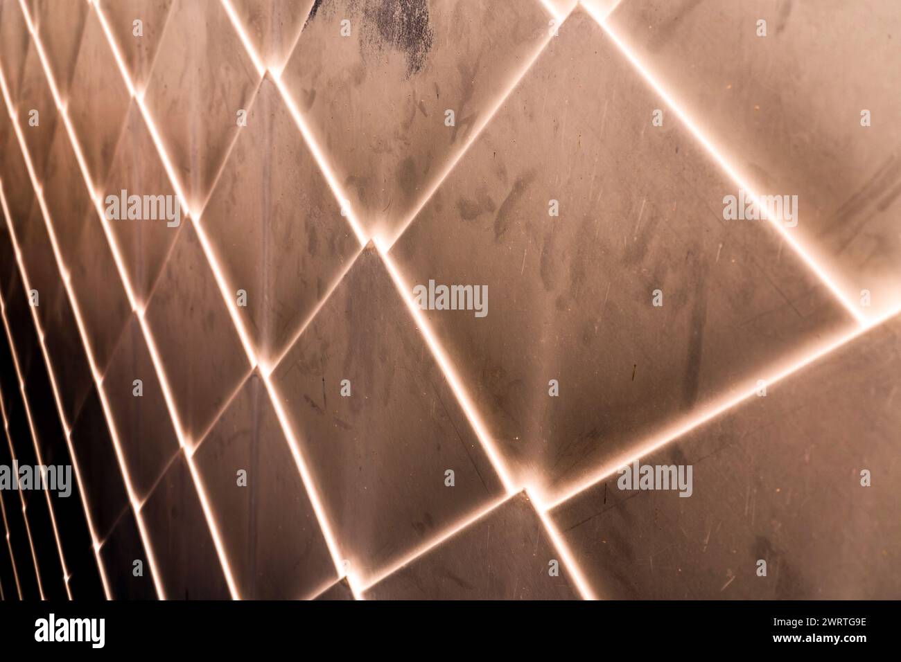 Diamond shaped fish scale tiled wall texture background close up Stock ...