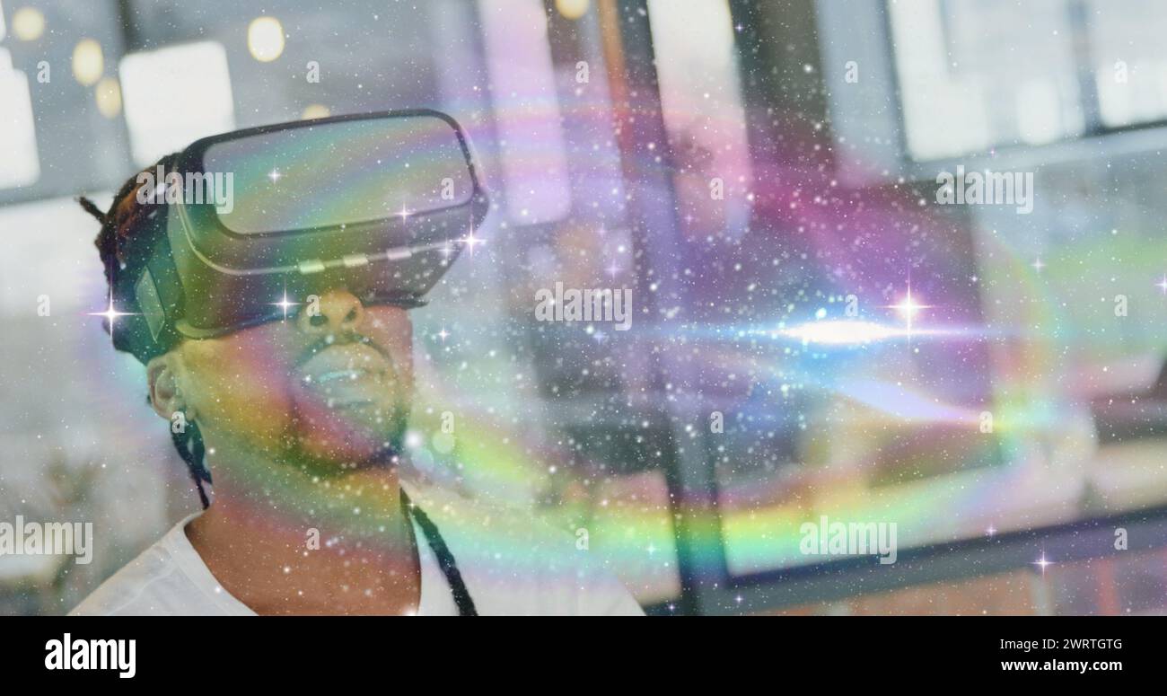 Image of digital interface with universe over man wearing VR headset ...