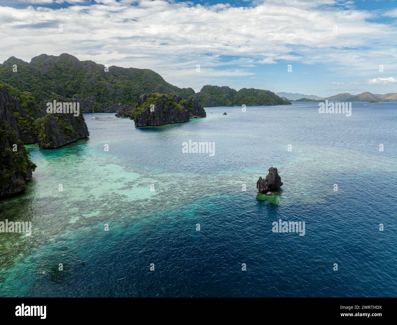 Splendid limestone rock formation in Coron. Islet and blue sea. Palawan ...