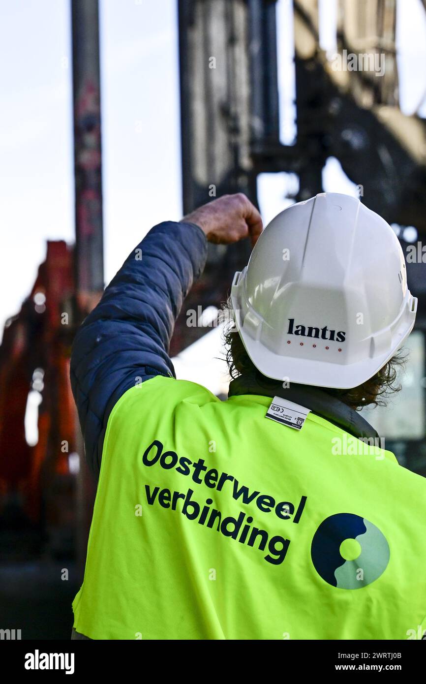 Antwerp, Belgium. 14th Mar, 2024. A man wears a Lantis helmet and a ...