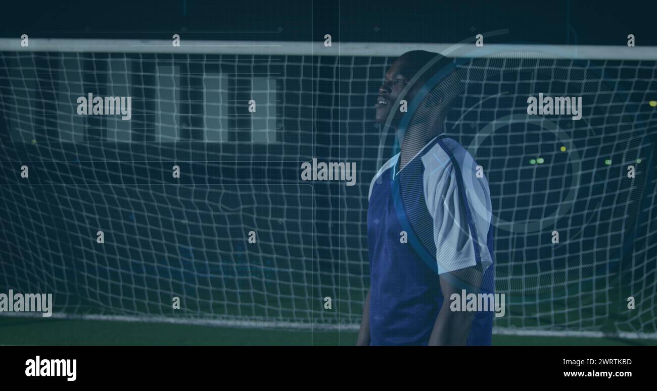 Image of scanner processing data over african american male footballer ...