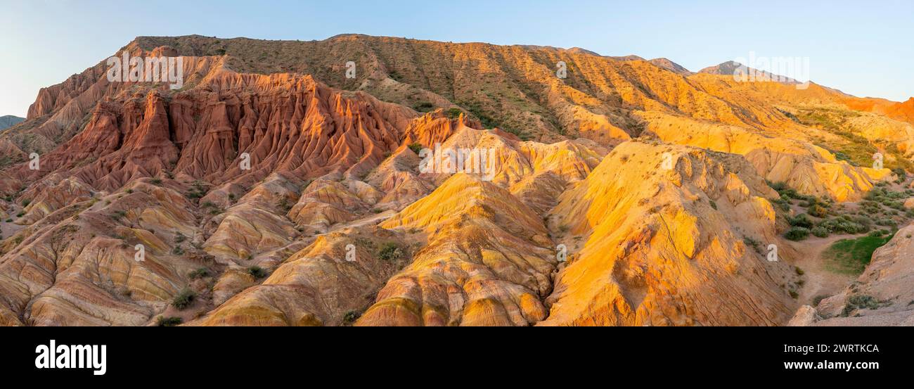 Erosion landscape of red and grey sandstone, rock formations at sunrise ...