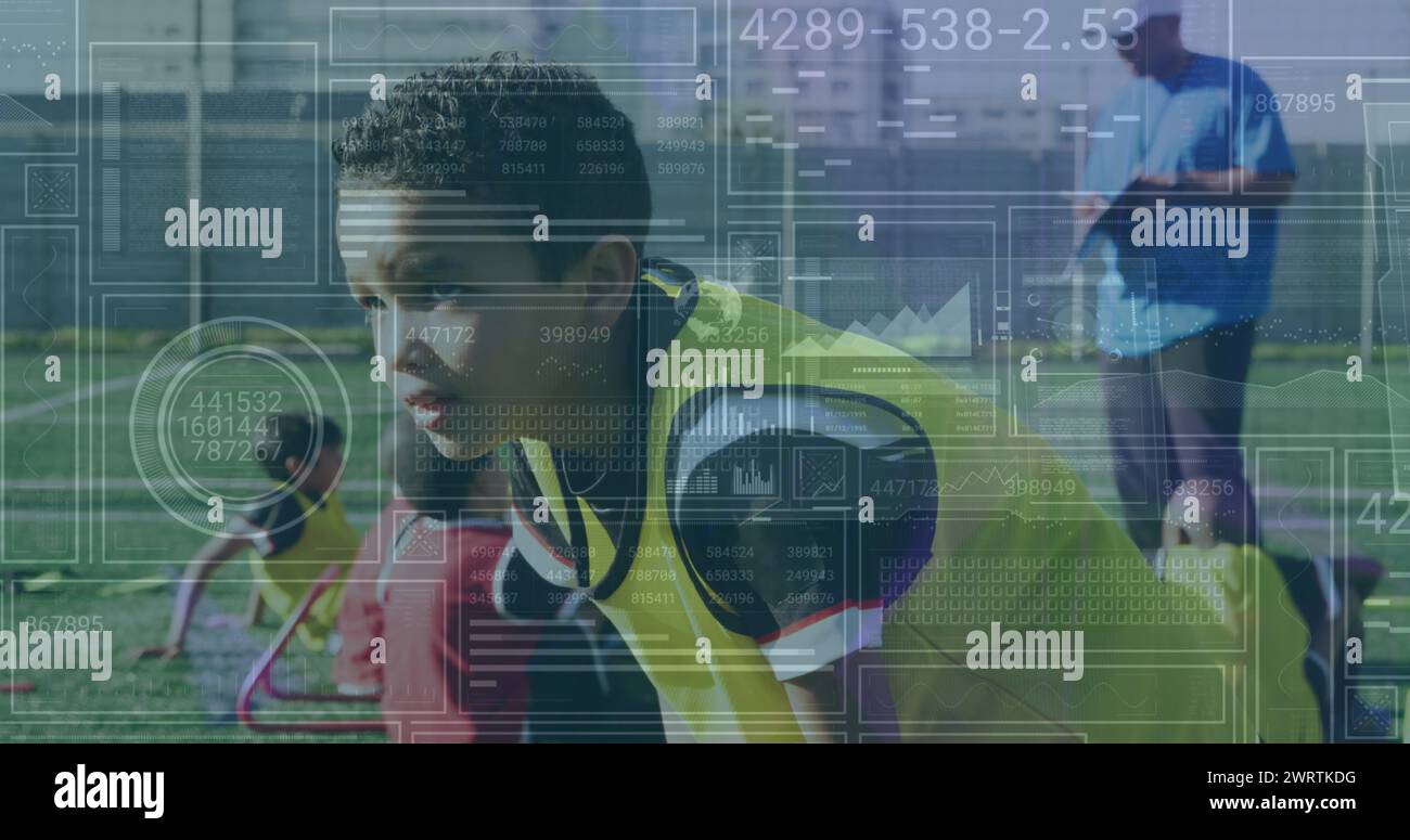 Image of scope scanning and data processing over biracial boy football ...