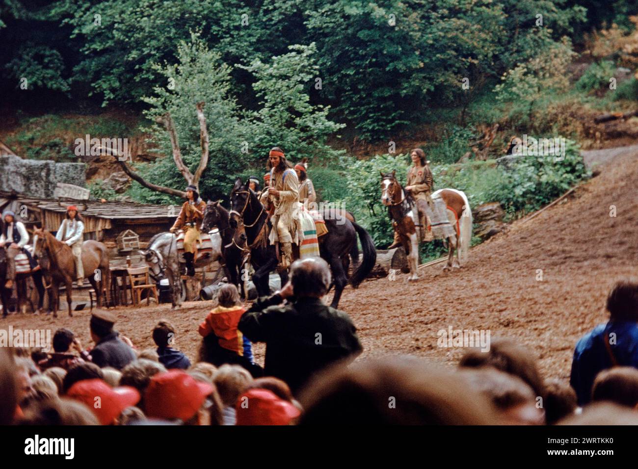 Pierre Brice as Winnetou and other actors riding horses in The Treasure ...