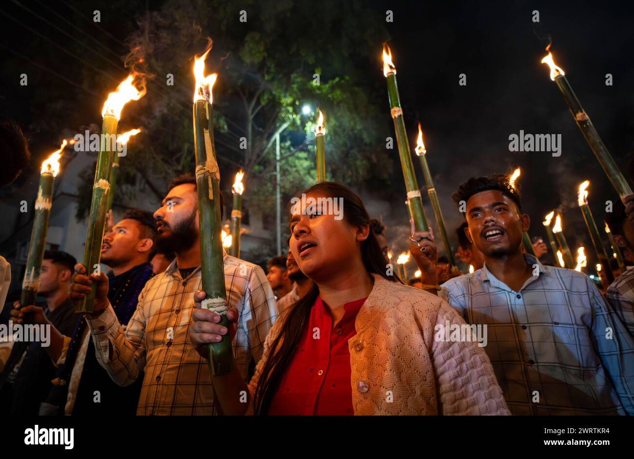 Members of the All Assam Students' Union (AASU) take part in a flaming ...