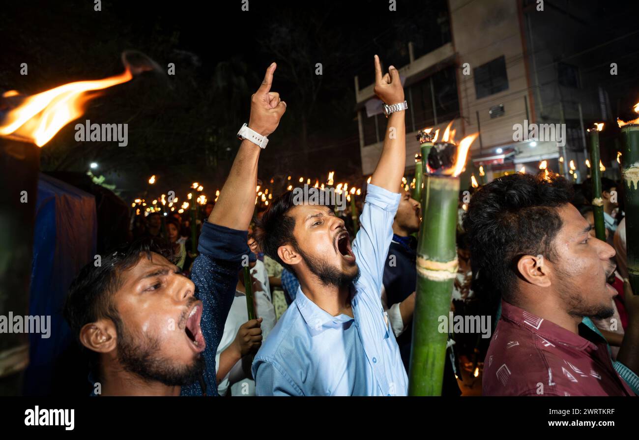Members of the All Assam Students' Union (AASU) take part in a flaming ...