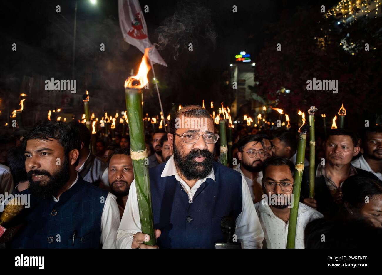Members of the All Assam Students' Union (AASU) take part in a flaming ...