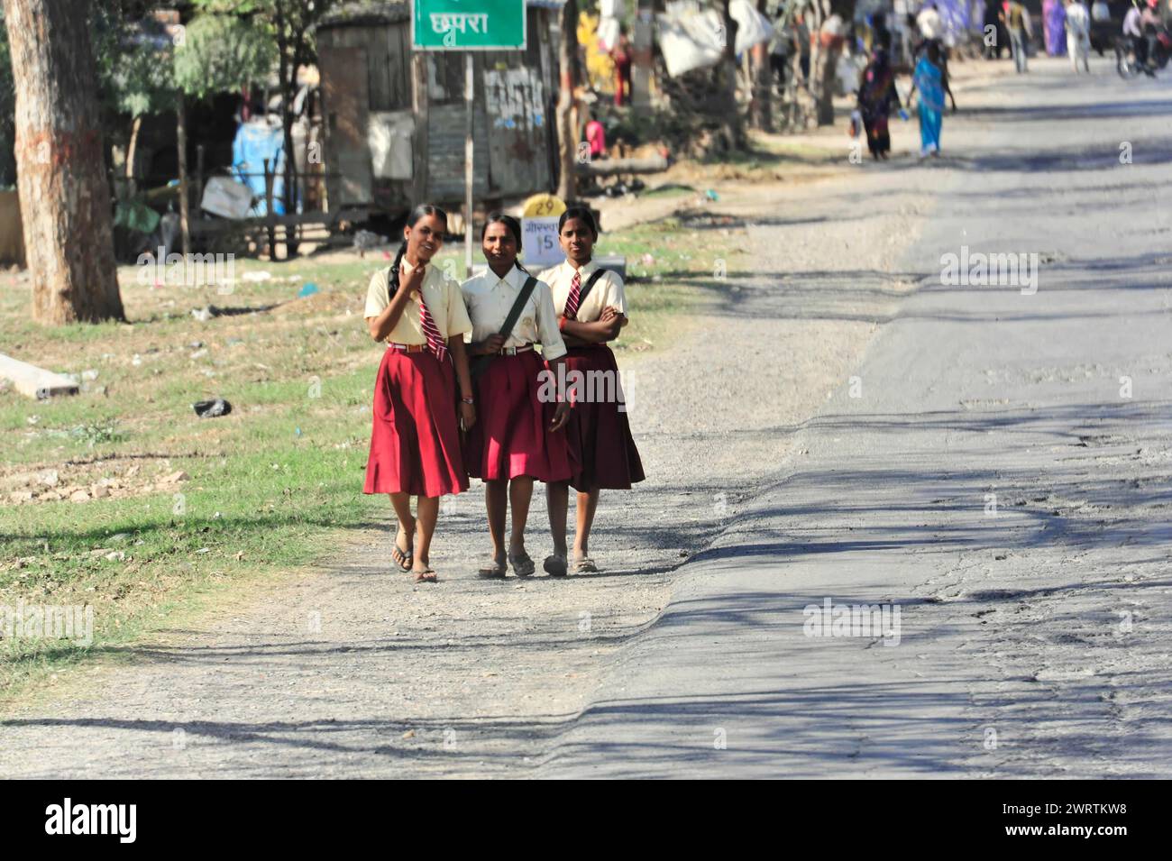 Three school girls in uniforms hi-res stock photography and images - Alamy