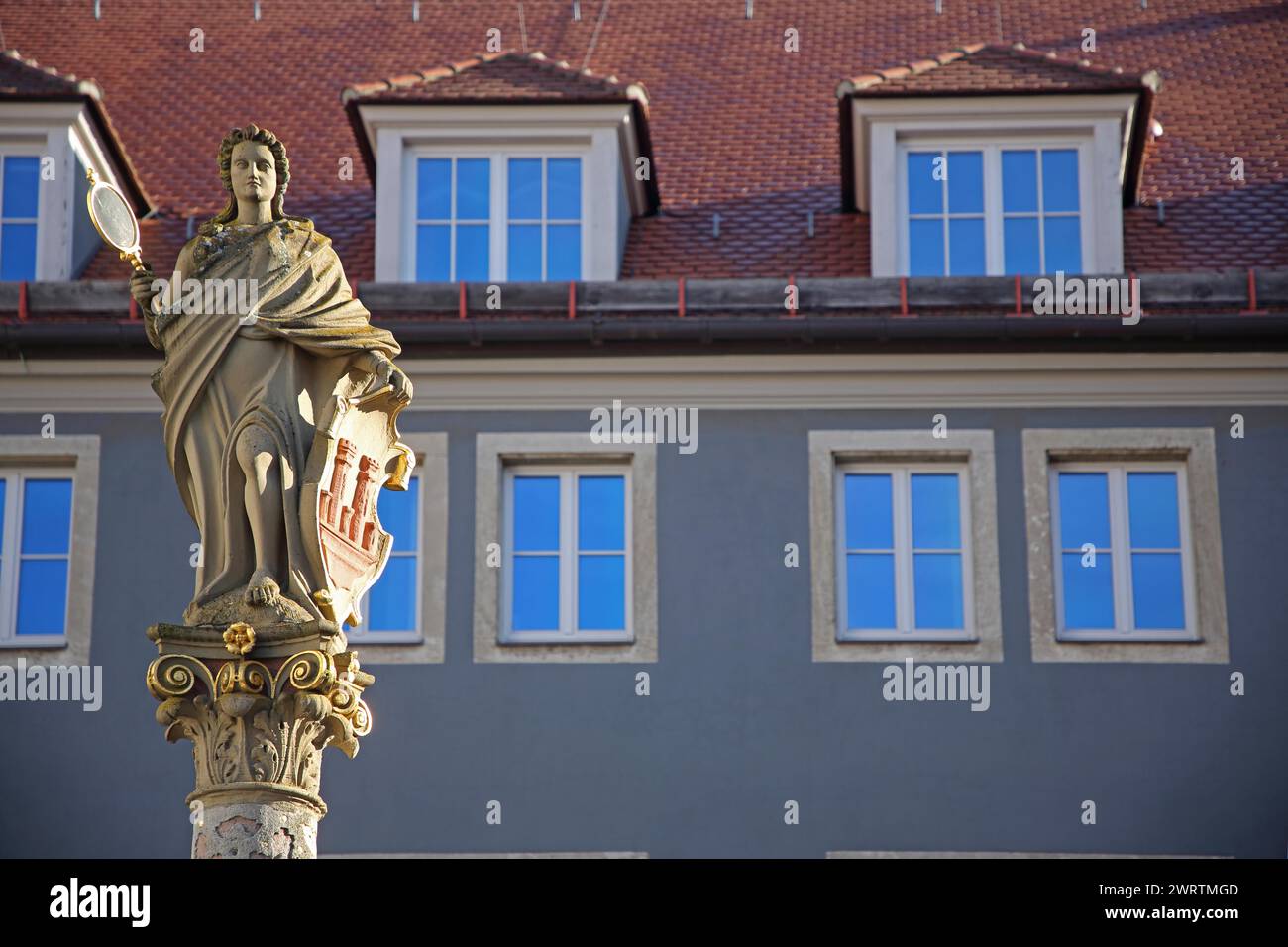 Patron saint Minerva with hand mirror and city coat of arms as shield ...