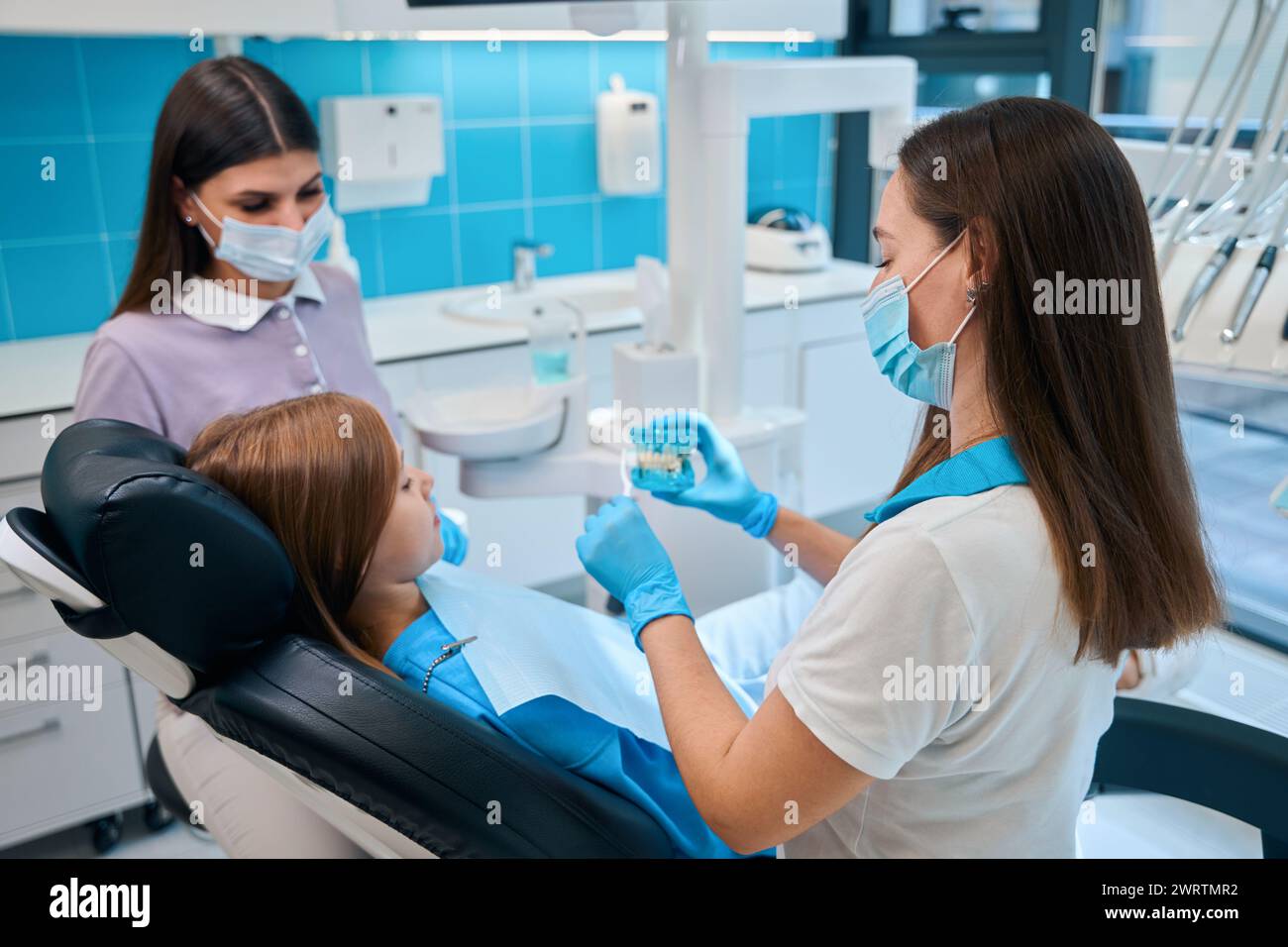 Girl at a dentists appointment in a modern clinic Stock Photo - Alamy