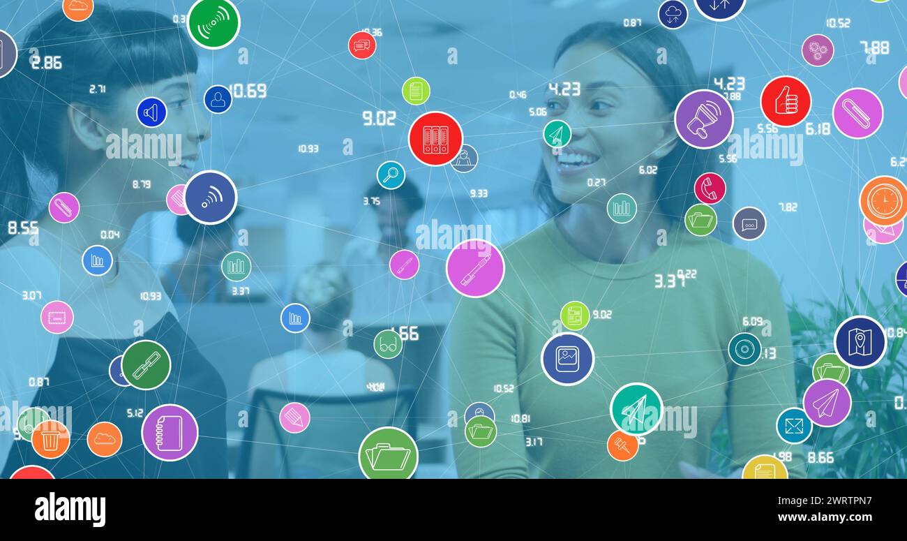 Image of connections with tech icons over diverse female coworkers in ...