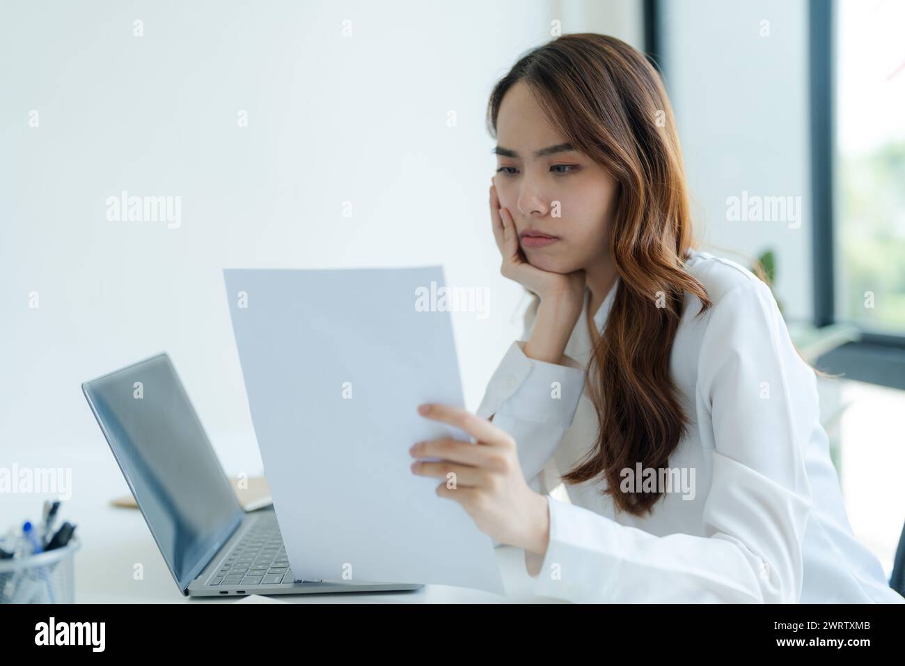 Businesswoman showing frustration, stress, regret, business went wrong ...