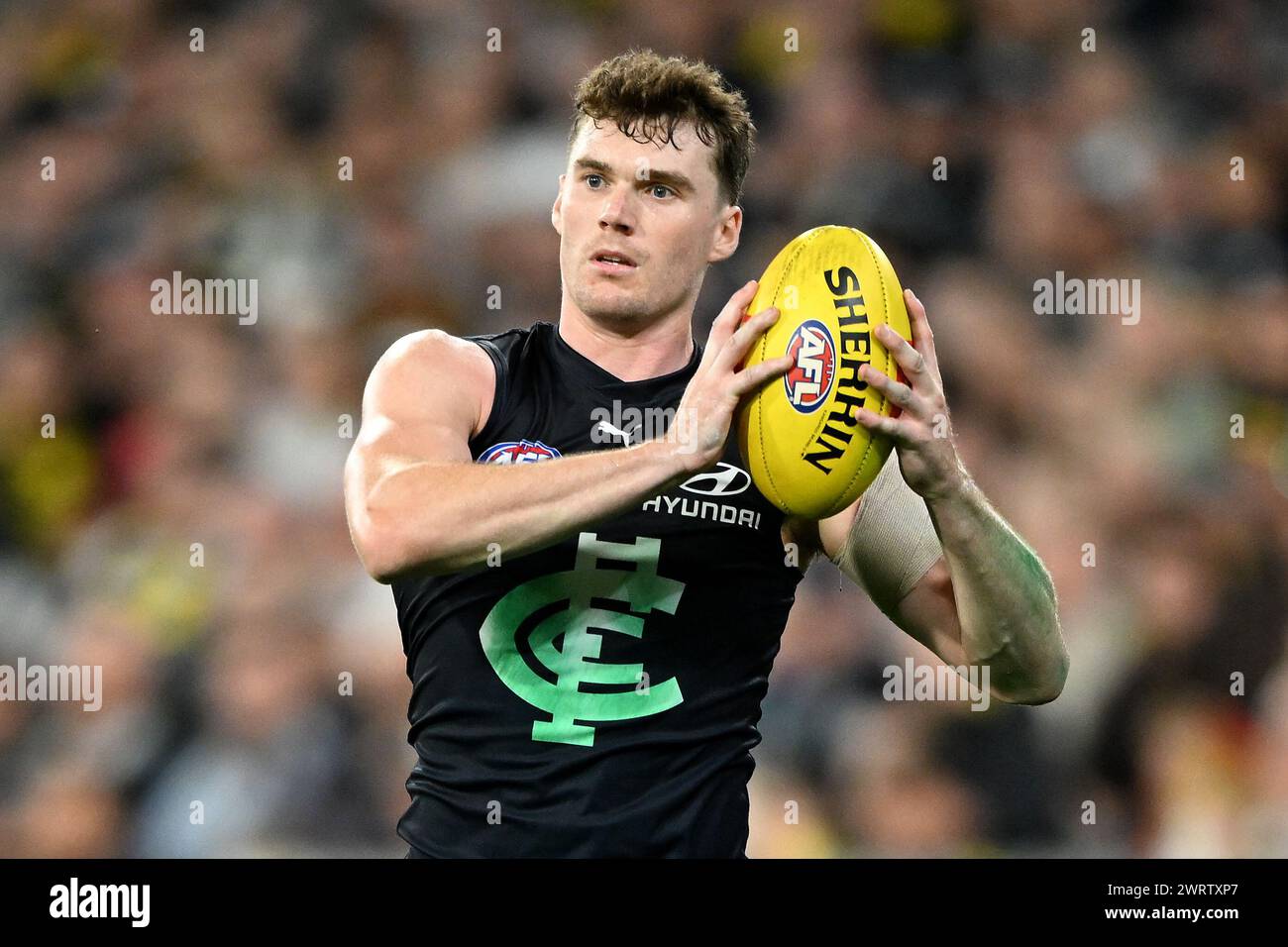 Melbourne, Australia. 14th Mar, 2024. Blake Acres of Carlton marks the ...