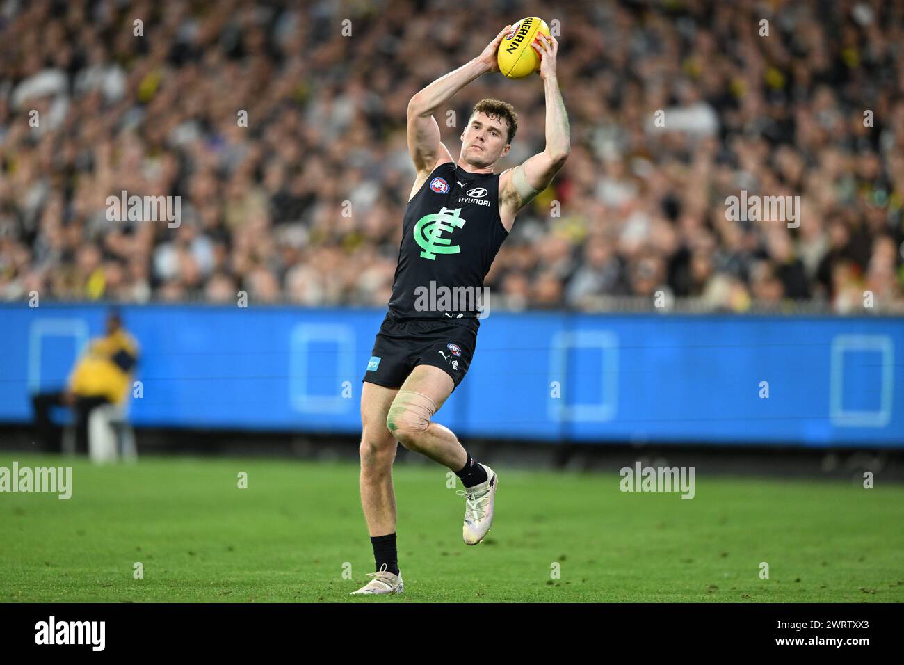 Melbourne, Australia. 14th Mar, 2024. Blake Acres of Carlton marks the ...