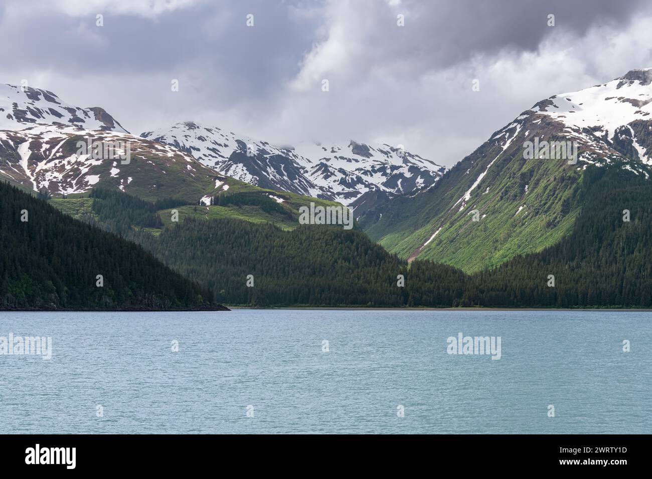 Sunlit snow capped mountains in favorite Channel, Alaska, USA Stock ...