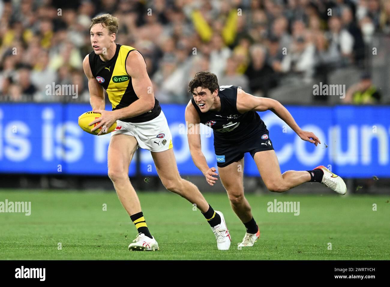 Melbourne, Australia. 14th Mar, 2024. Tom Lynch of Richmond (left) and ...