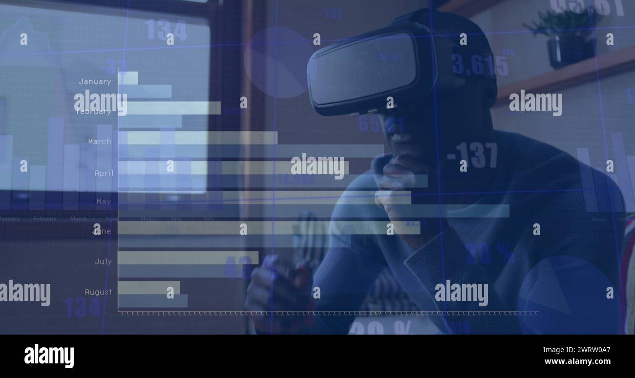 Image of data processing over african american man using vr headset ...