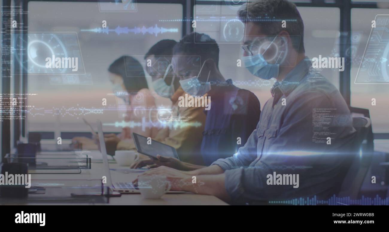 Image of data processing over diverse colleagues wearing face masks working at office Stock ...