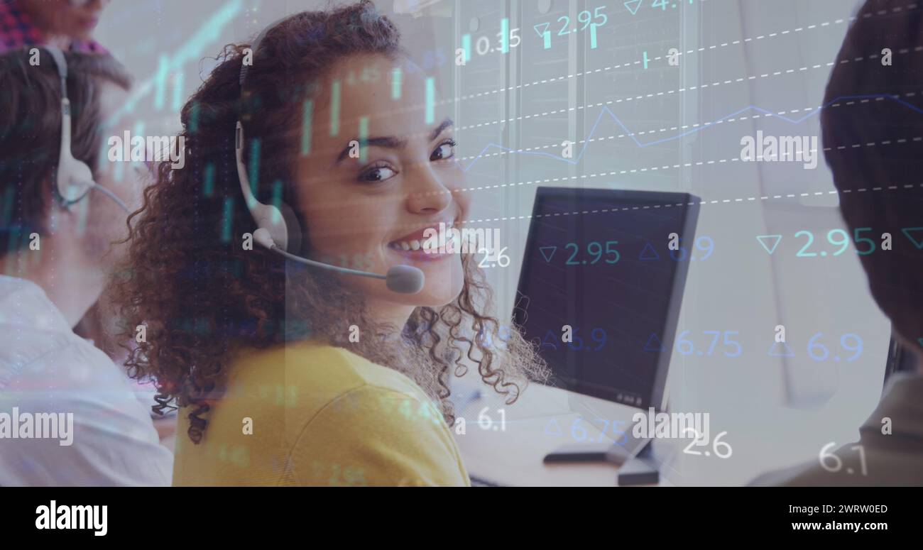 Image of financial graphs and data over happy biracial female call ...