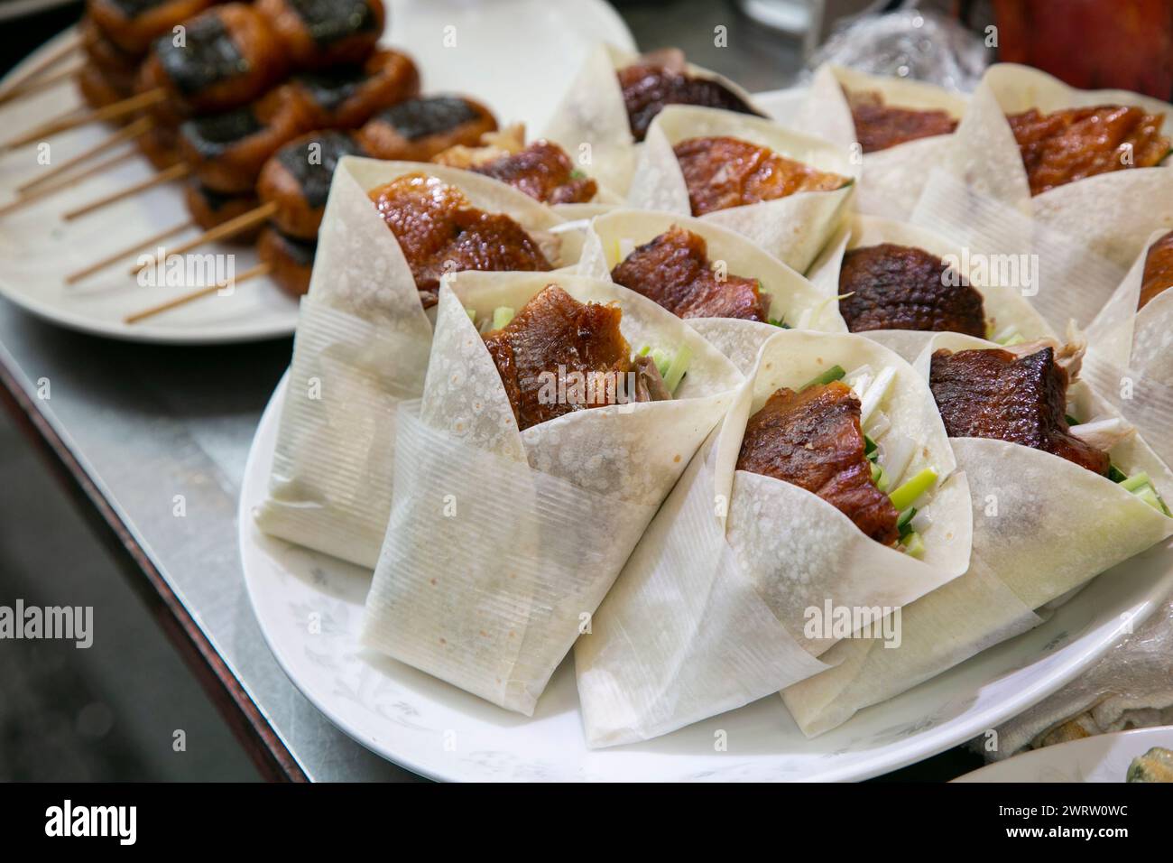 Crispy Peking duck cooked in the Chinese district of Nankinmachi in the ...