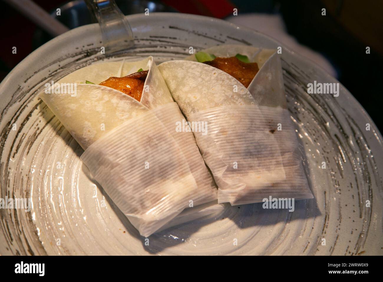 Crispy Peking duck cooked in the Chinese district of Nankinmachi in the ...