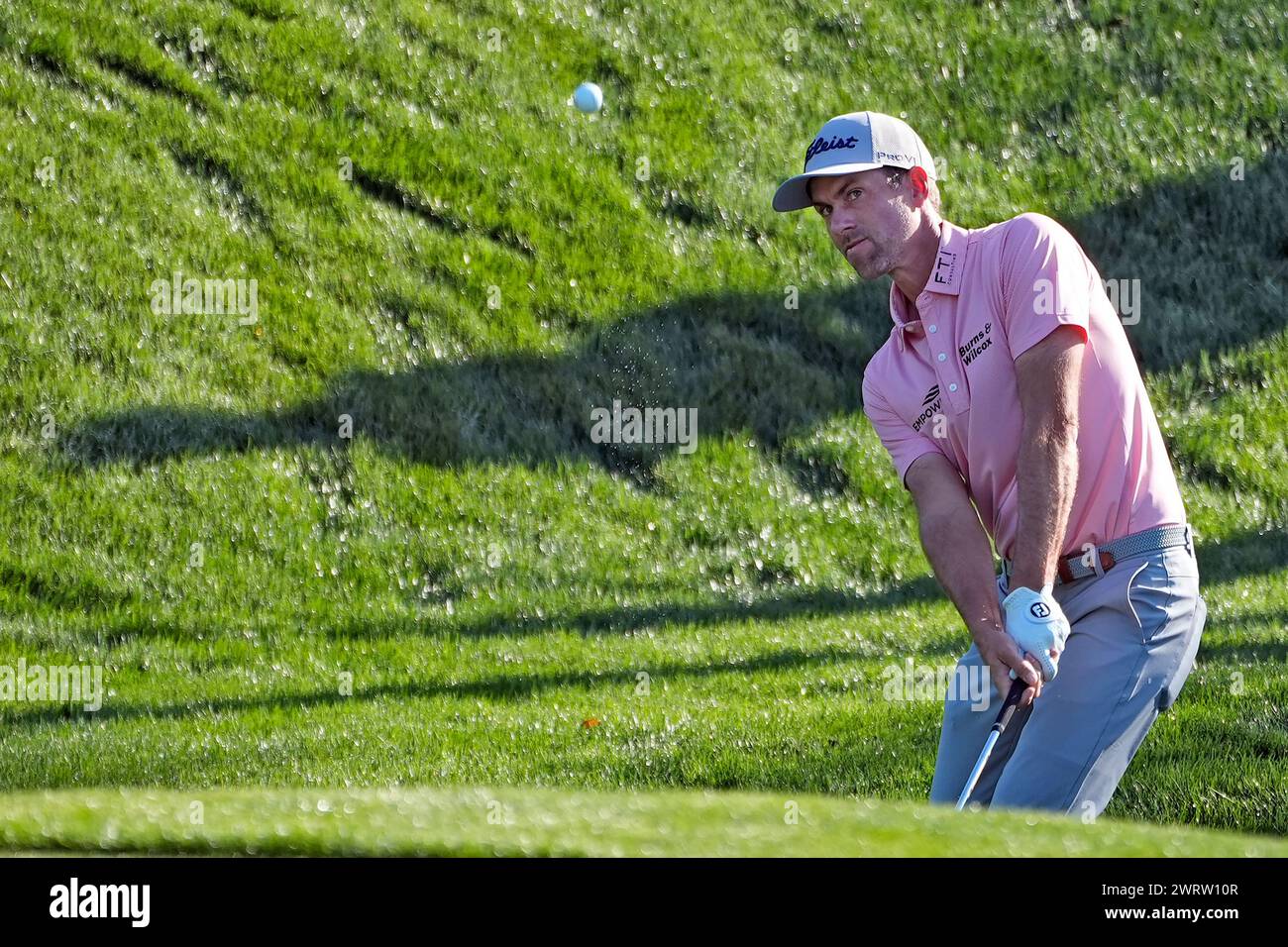 Webb Simpson chips onto the second green during the first round of The ...