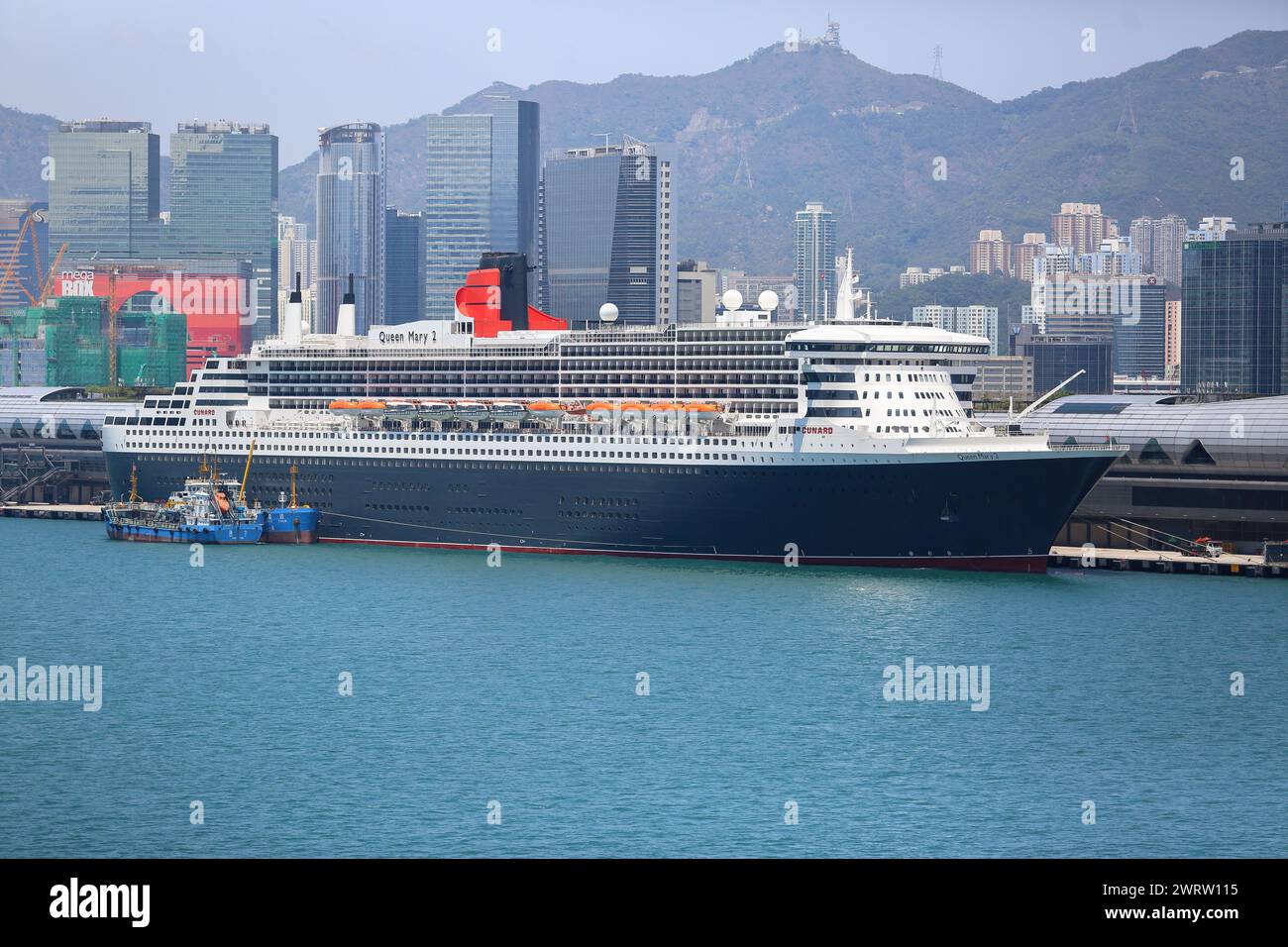 Hong Kong, China. March 14, 2024: Ocean liner Queen Mary 2 docked in ...