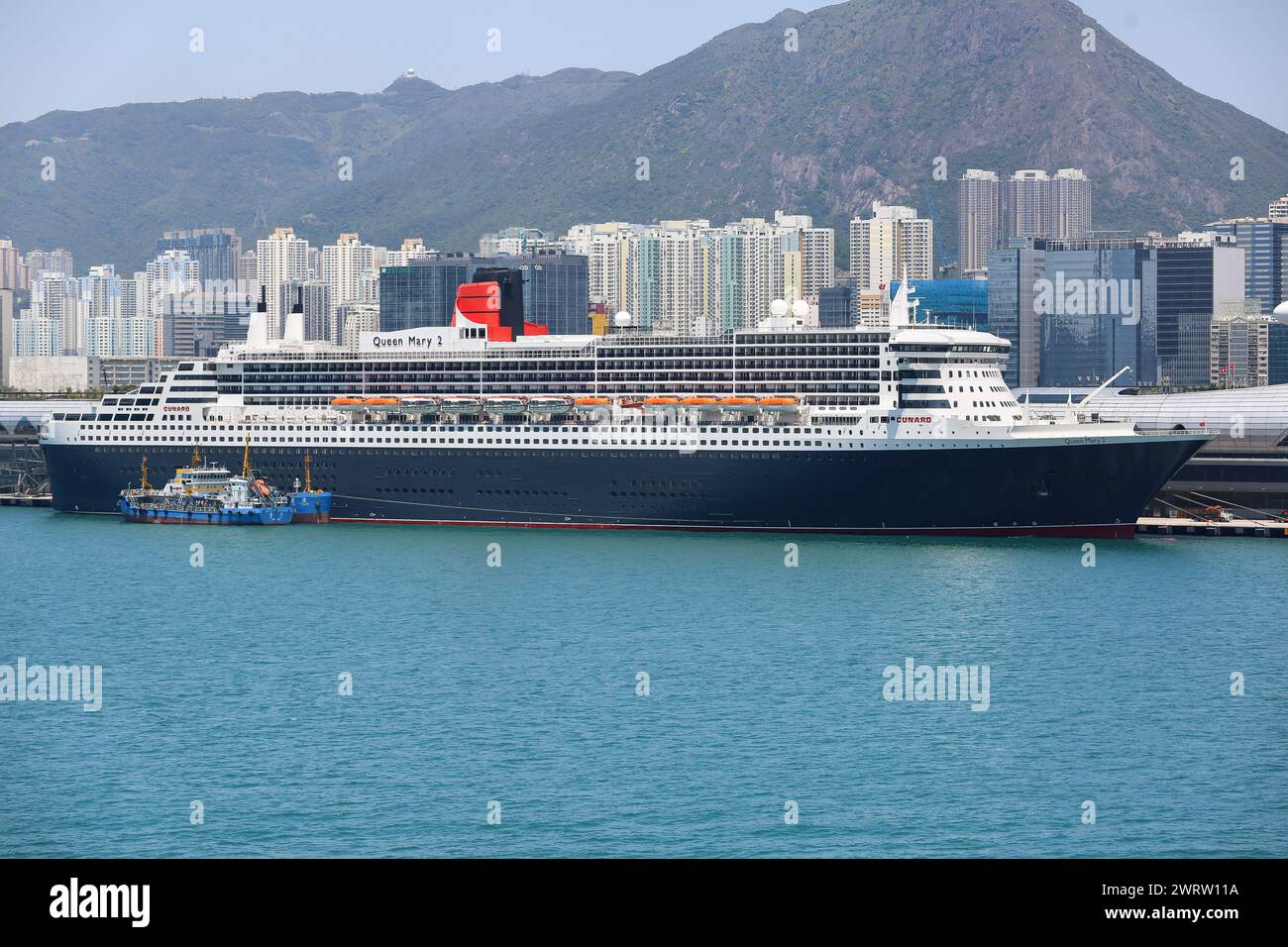 Hong Kong, China. March 14, 2024: Ocean liner Queen Mary 2 docked in ...