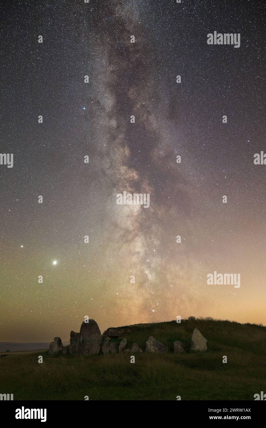 West Kennet long barrow, Wiltshire, UK at night with the milky way ...
