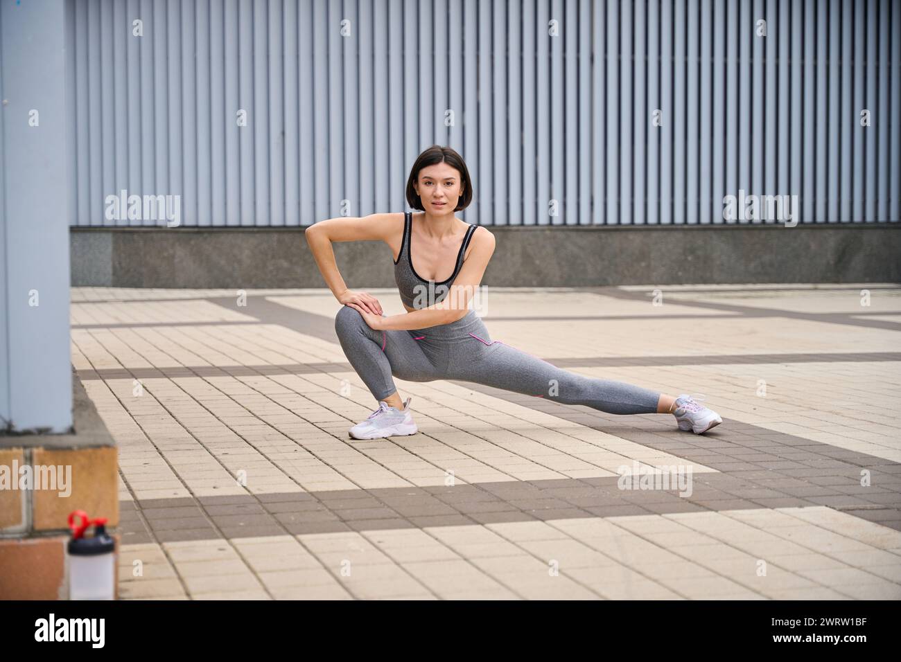 Female on morning activity, cardio and strength training Stock Photo ...