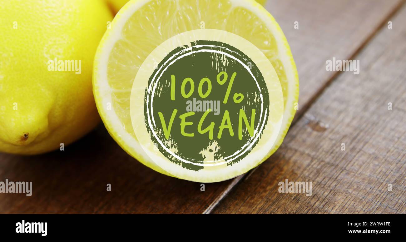 Image of 100 percent vegan text over fresh lemons Stock Photo - Alamy