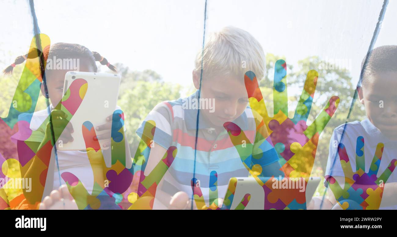 Image of colourful hands over kids friends using electronic devices ...