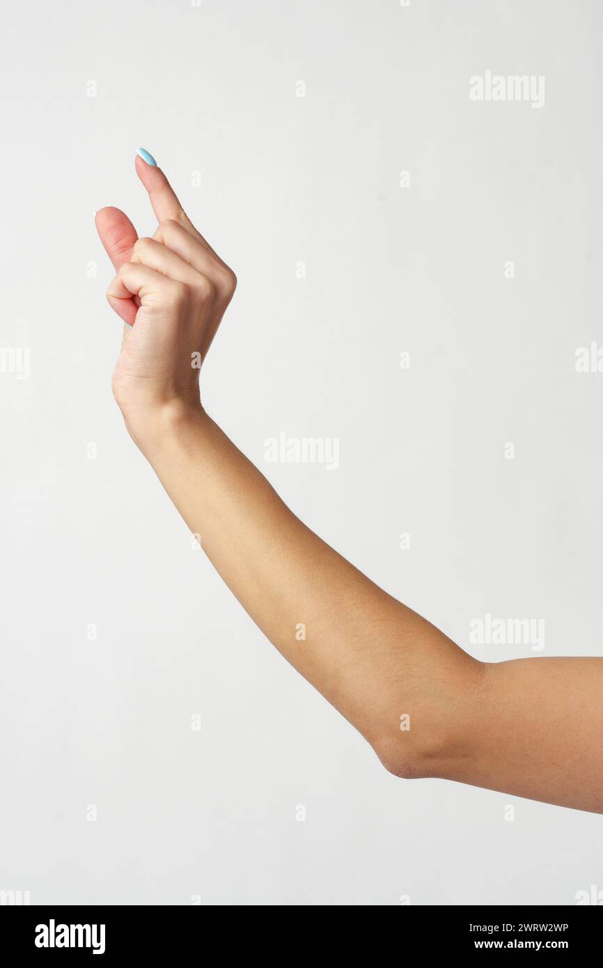 Hand picking something against white background copy space Stock Photo ...