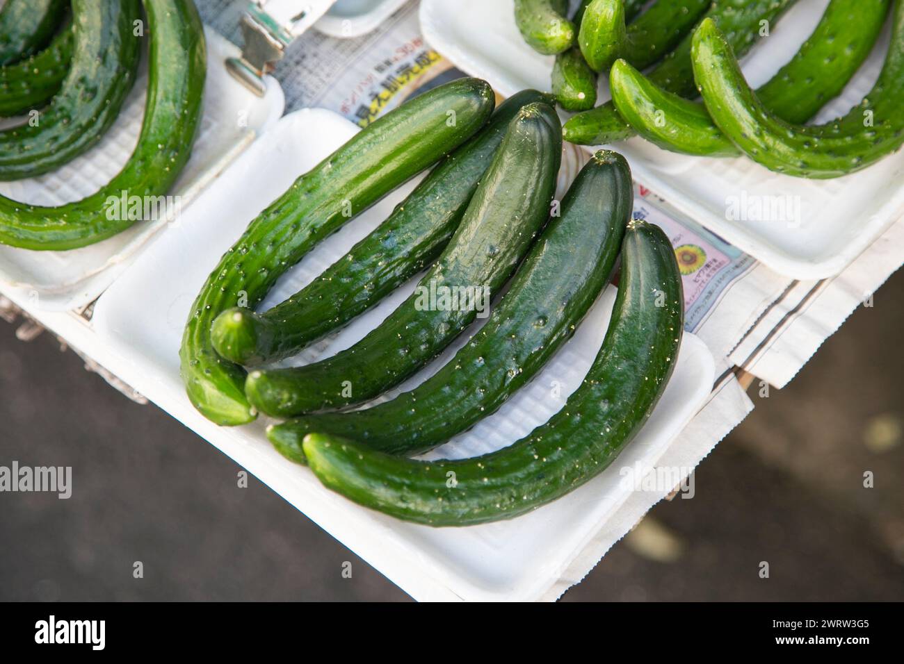 Japanese curved cucumbers at a Kyoto fruit market in Japan Stock Photo ...