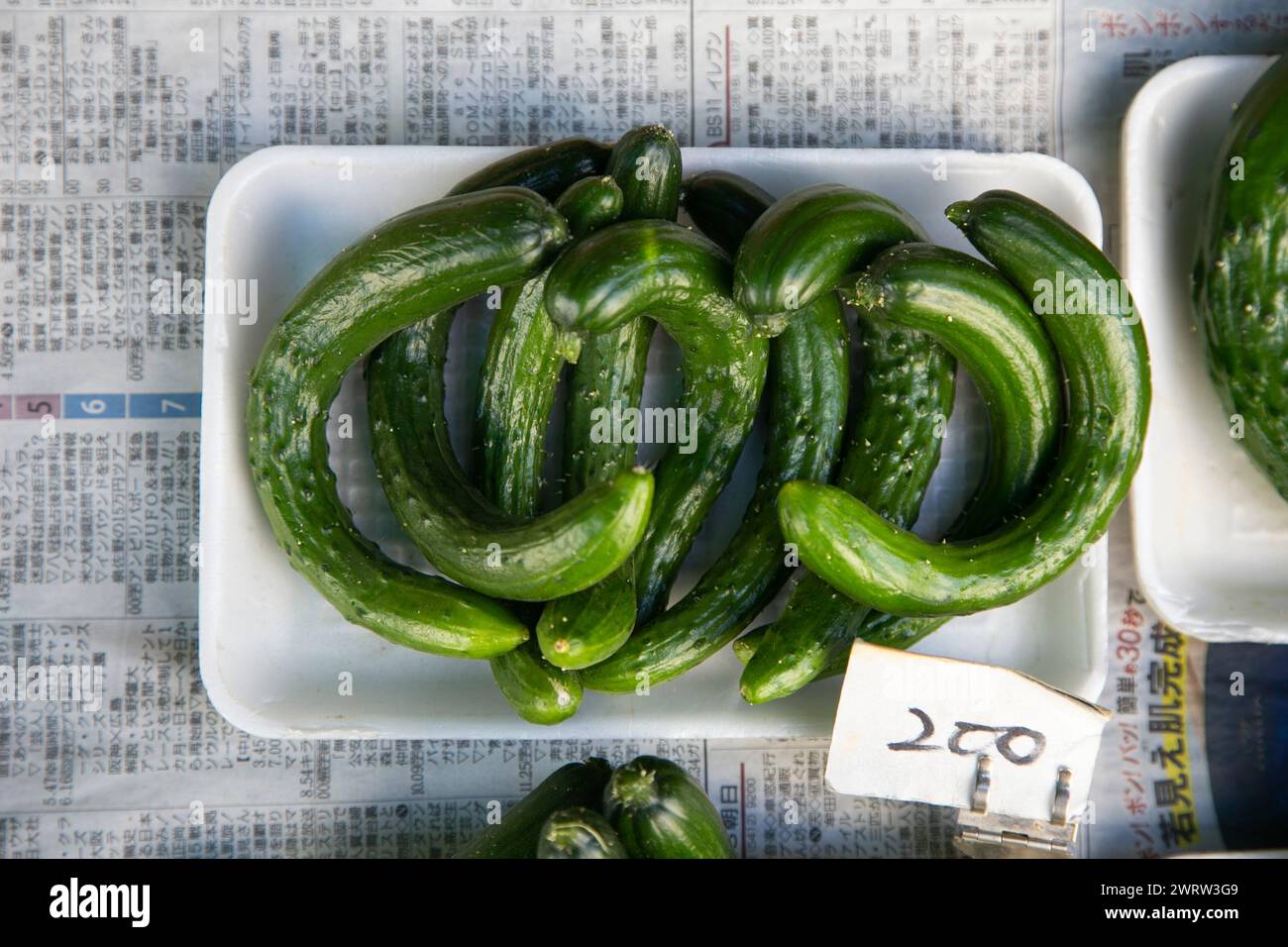 Japanese curved cucumbers at a Kyoto fruit market in Japan Stock Photo ...