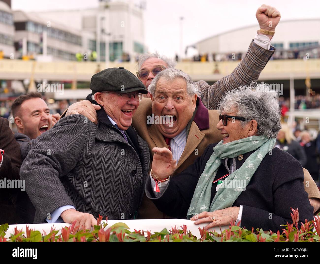 Sir Alex Ferguson, owner of Monmiral, celebrates alongside Alan Halsall ...